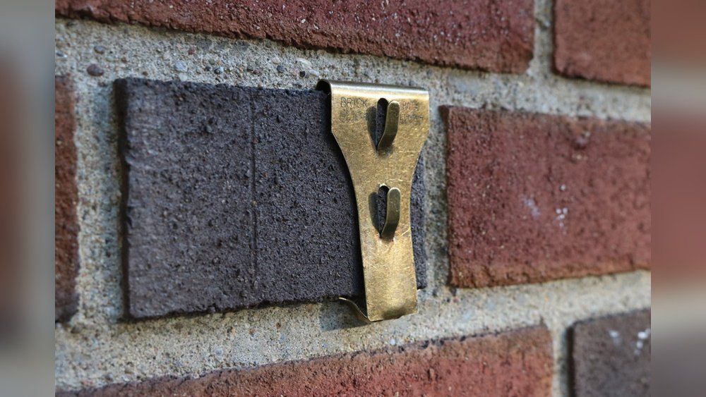 How to Hang Art on Brick Wall: Easy Steps for a Perfect Display - SofaNest